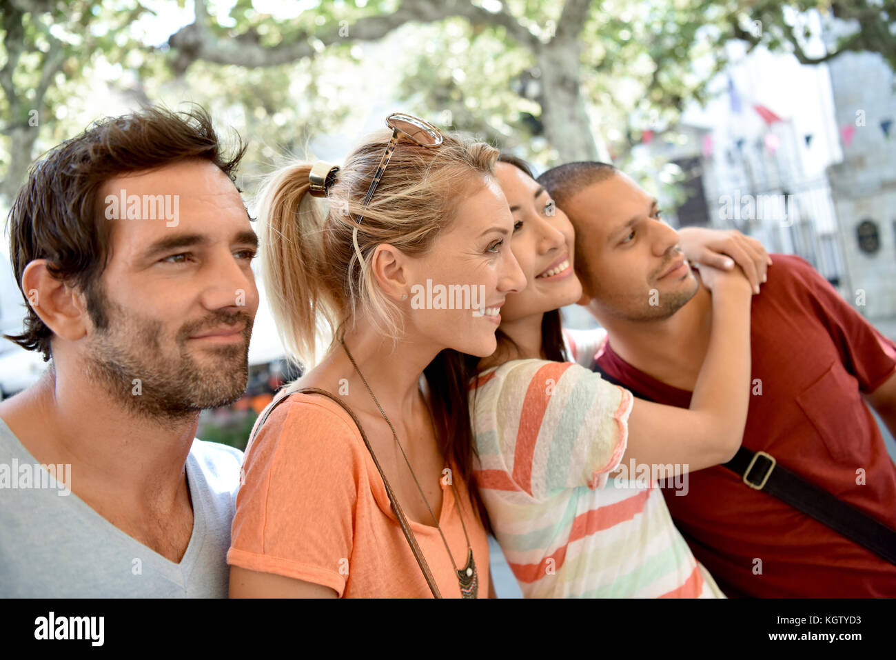 Portrait of friends being happy together, summertime Stock Photo - Alamy