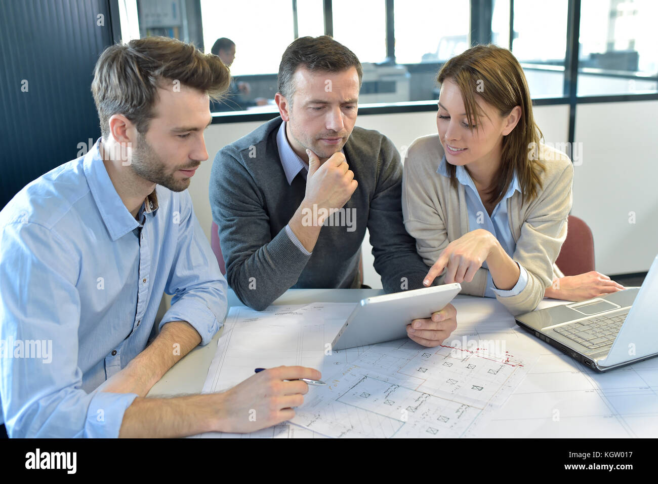 Business people meeting around table Stock Photo - Alamy