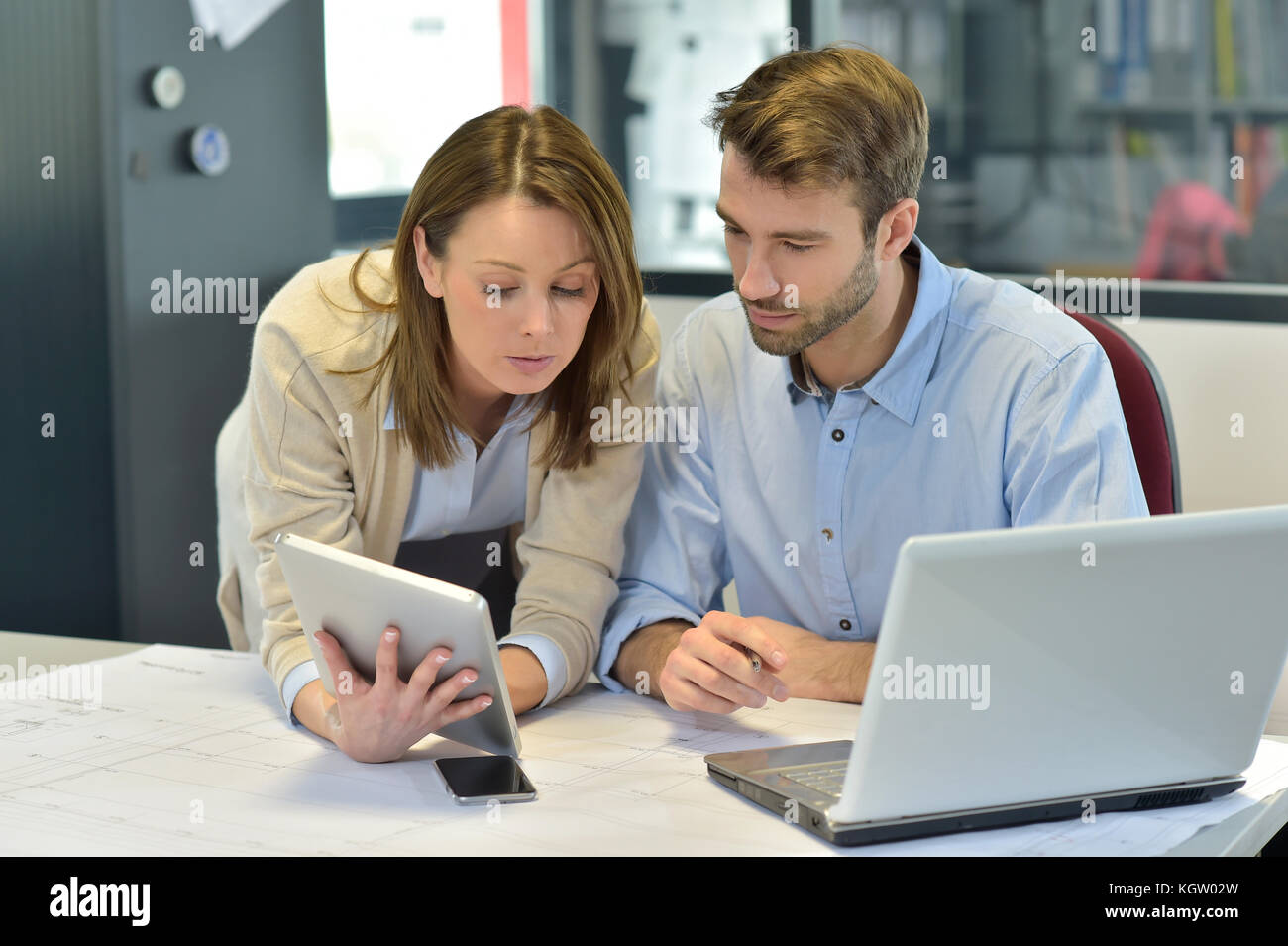 Business people working together in office Stock Photo - Alamy