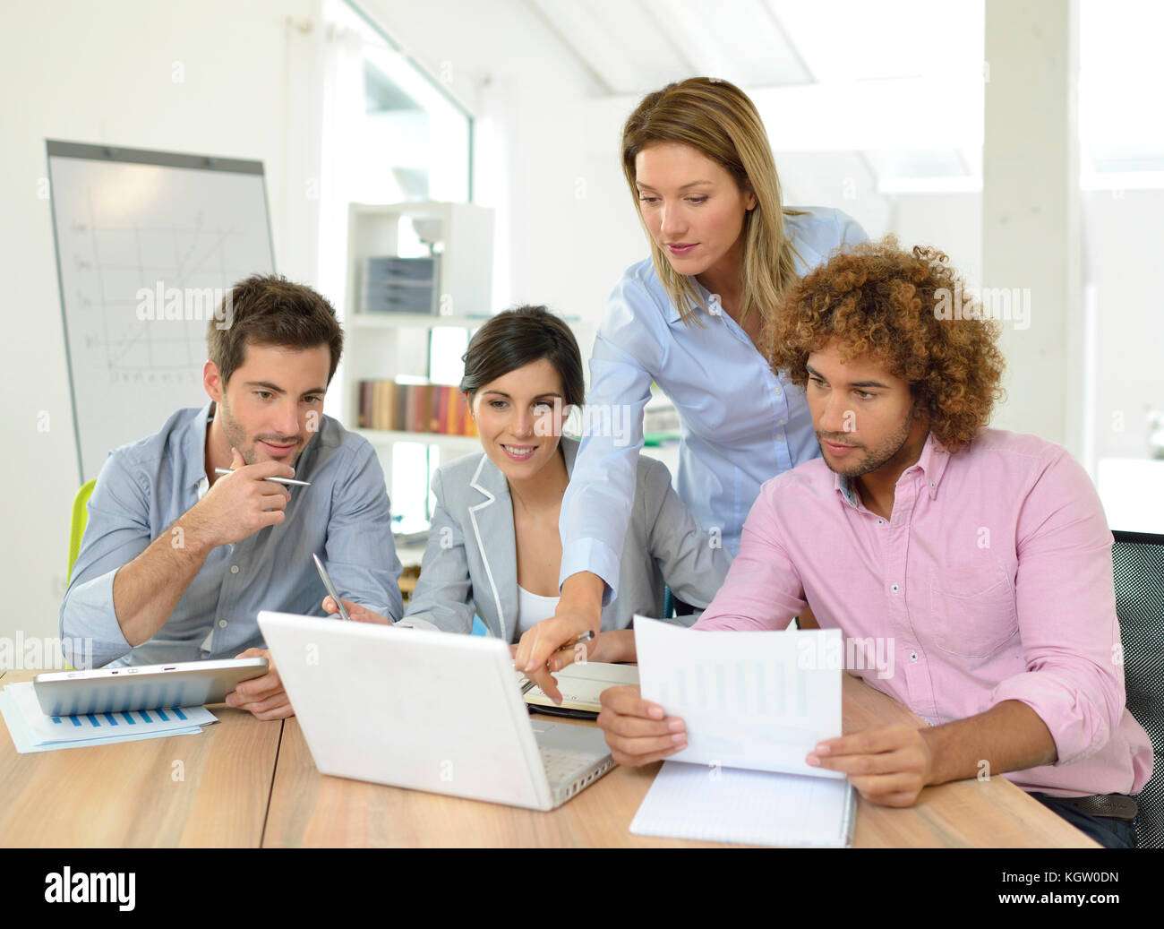 Woman manager with employees team Stock Photo - Alamy
