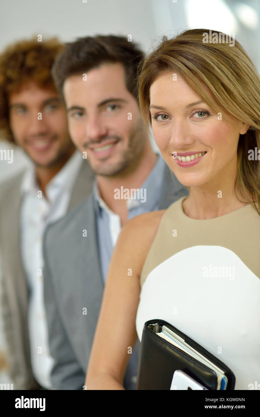 Successful business partners standing together Stock Photo - Alamy