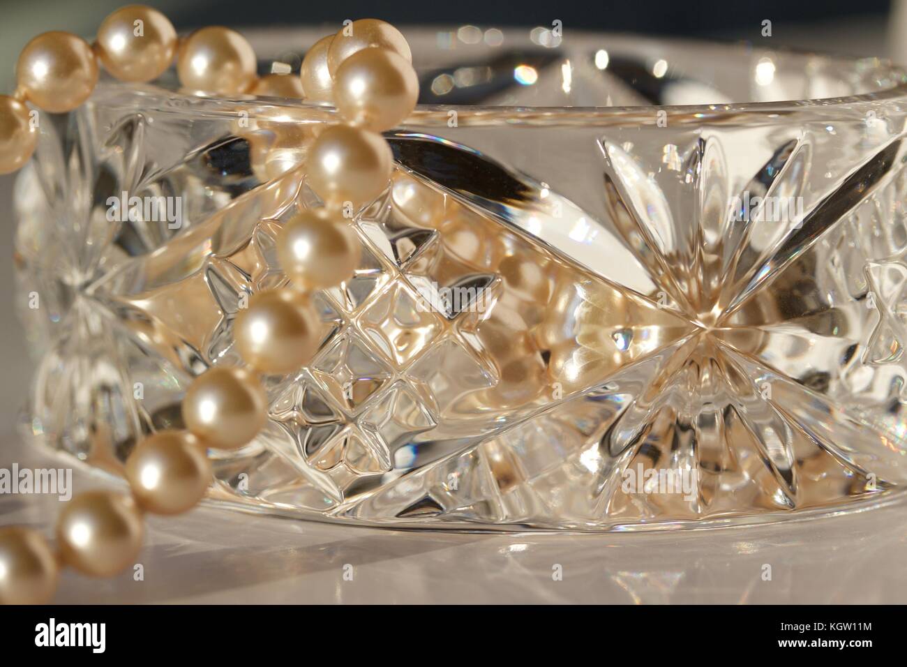 Close up image shows cultured pearls adorning a beautiful lead crystal ...