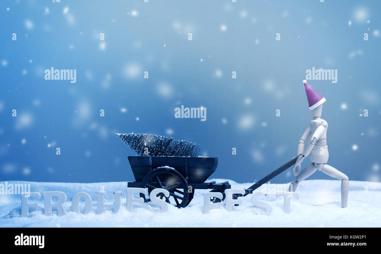 Wooden puppet with an old wooden cart deliver a Christmas tree Stock ...