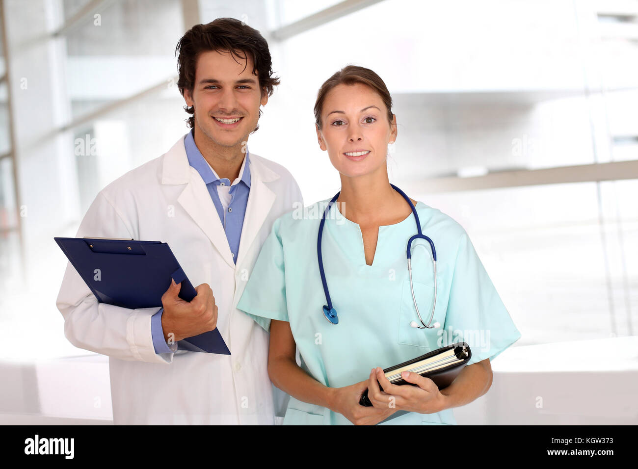 Medical people standing in hospital hallway Stock Photo - Alamy