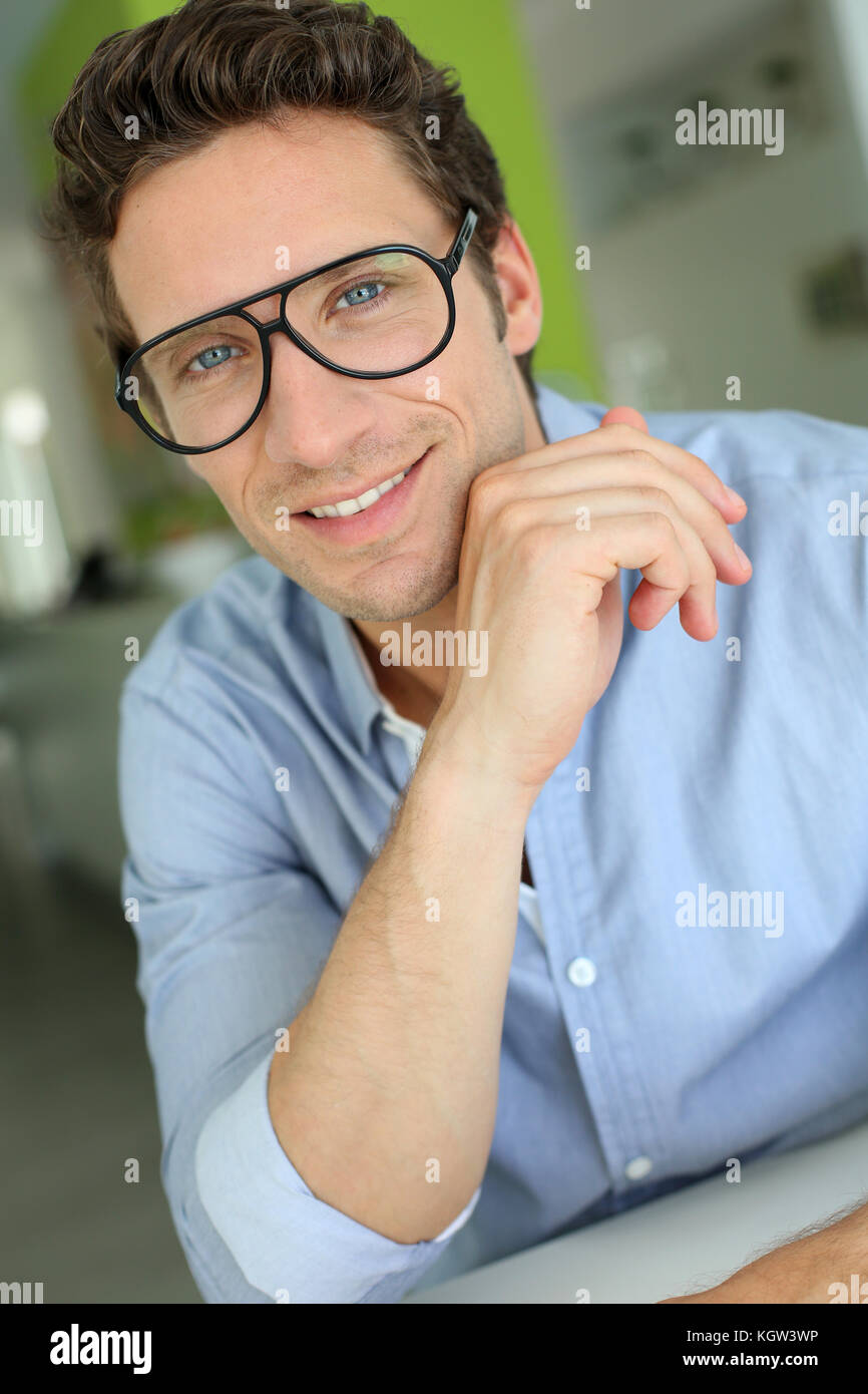 Modern guy with eyeglasses on Stock Photo - Alamy