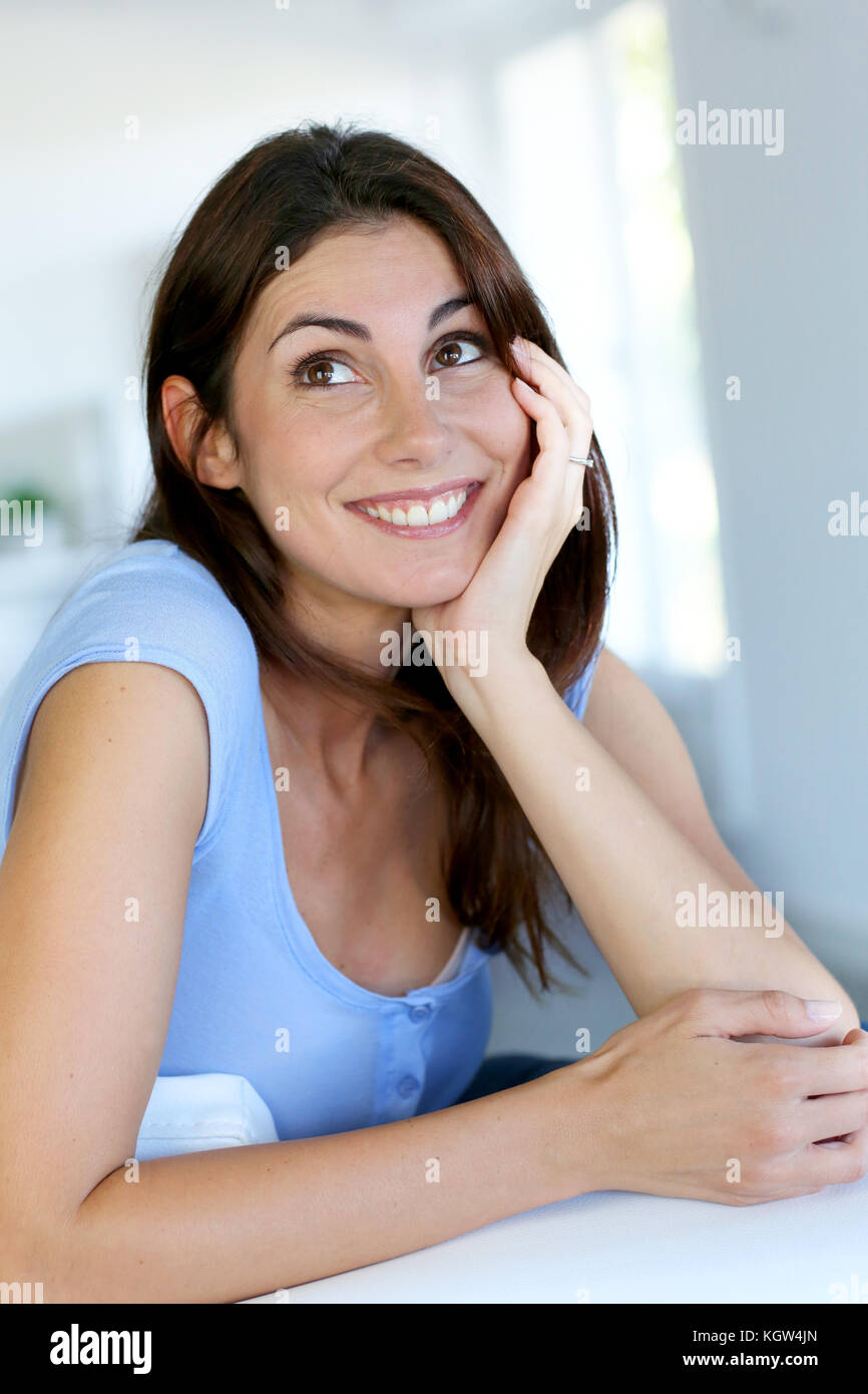 Closeup of smiling girl with satisfied look on her face Stock Photo - Alamy