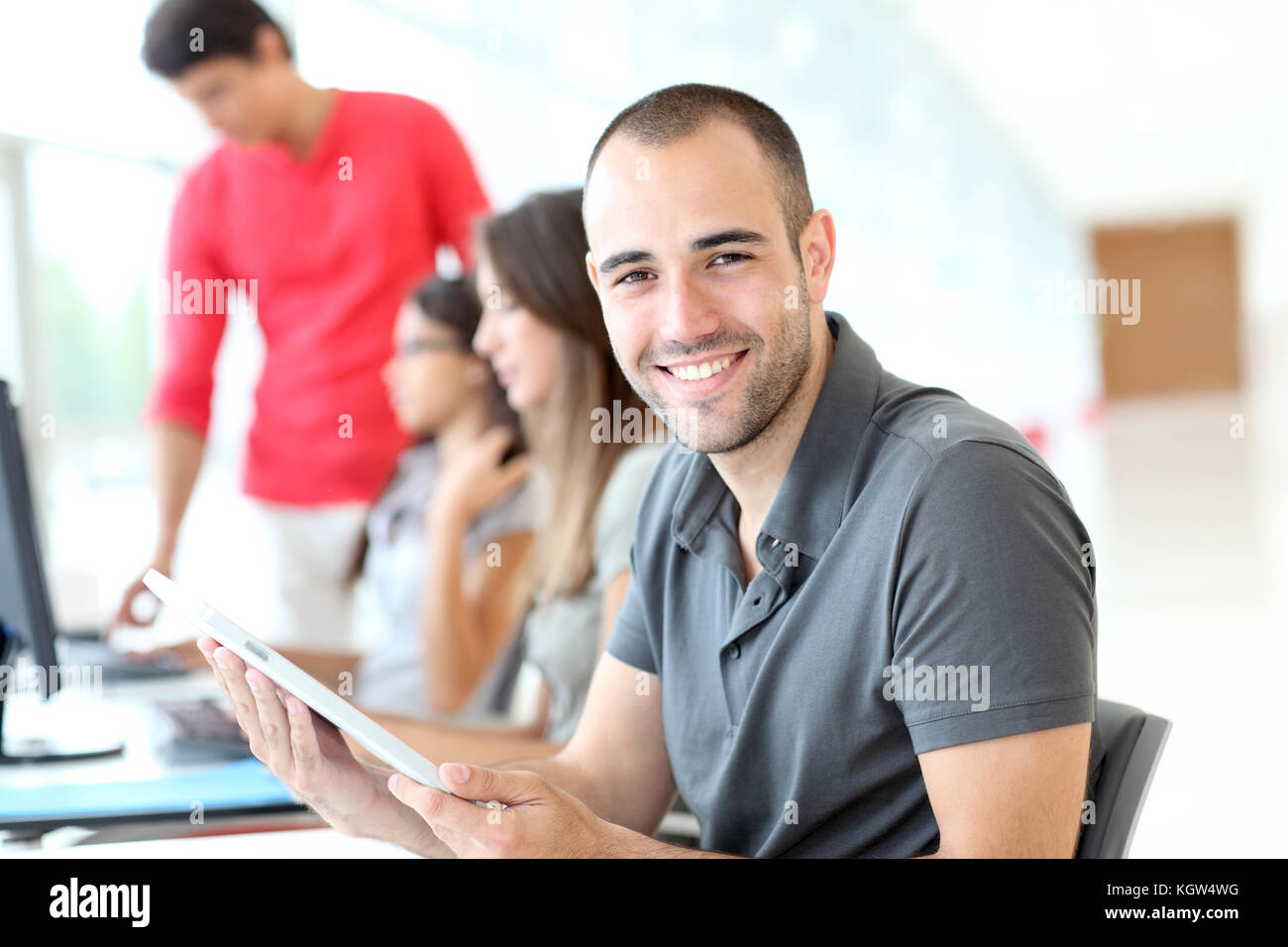 Portrait of smiling student in training course Stock Photo - Alamy