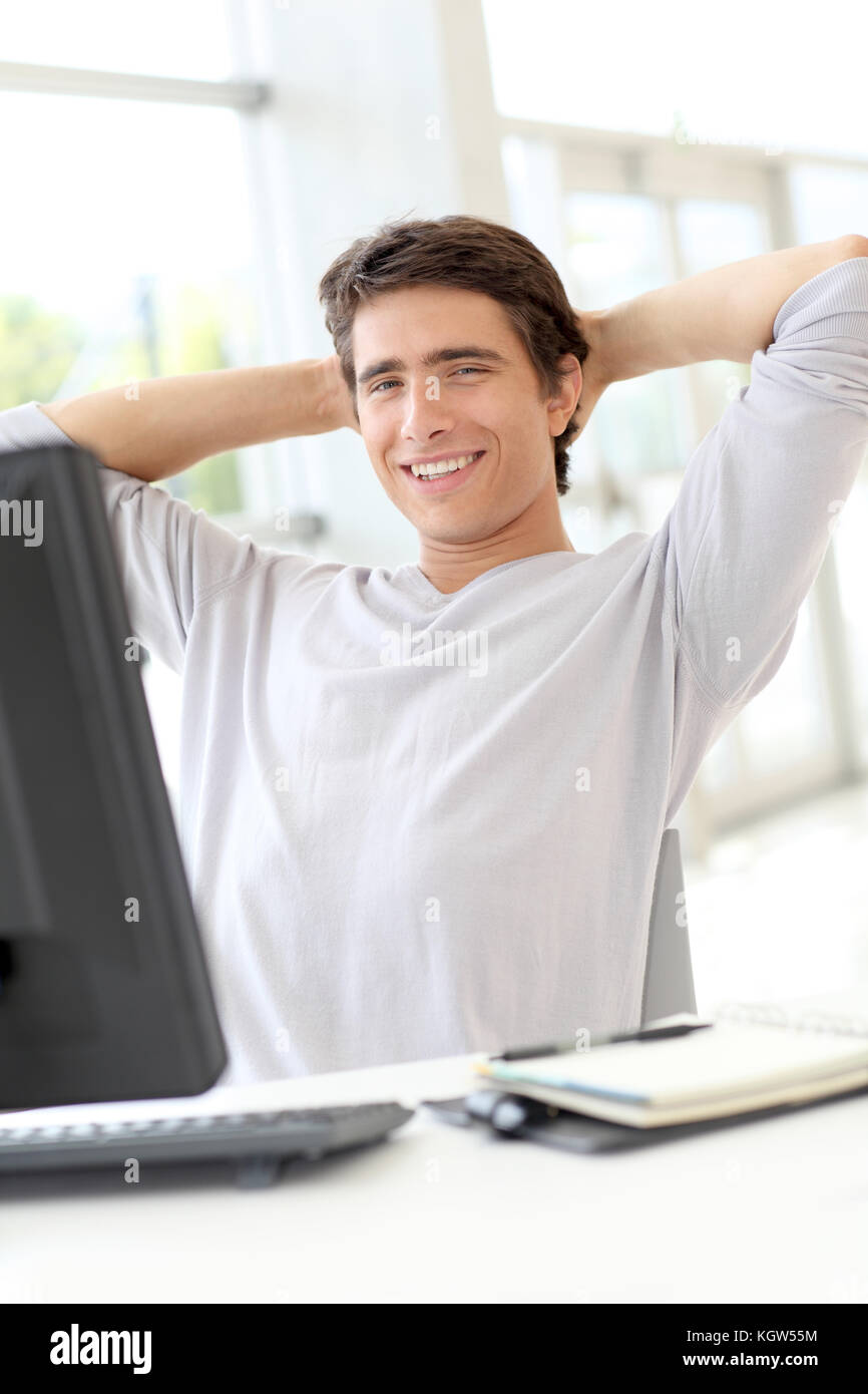 Portrait of relaxed office worker Stock Photo - Alamy