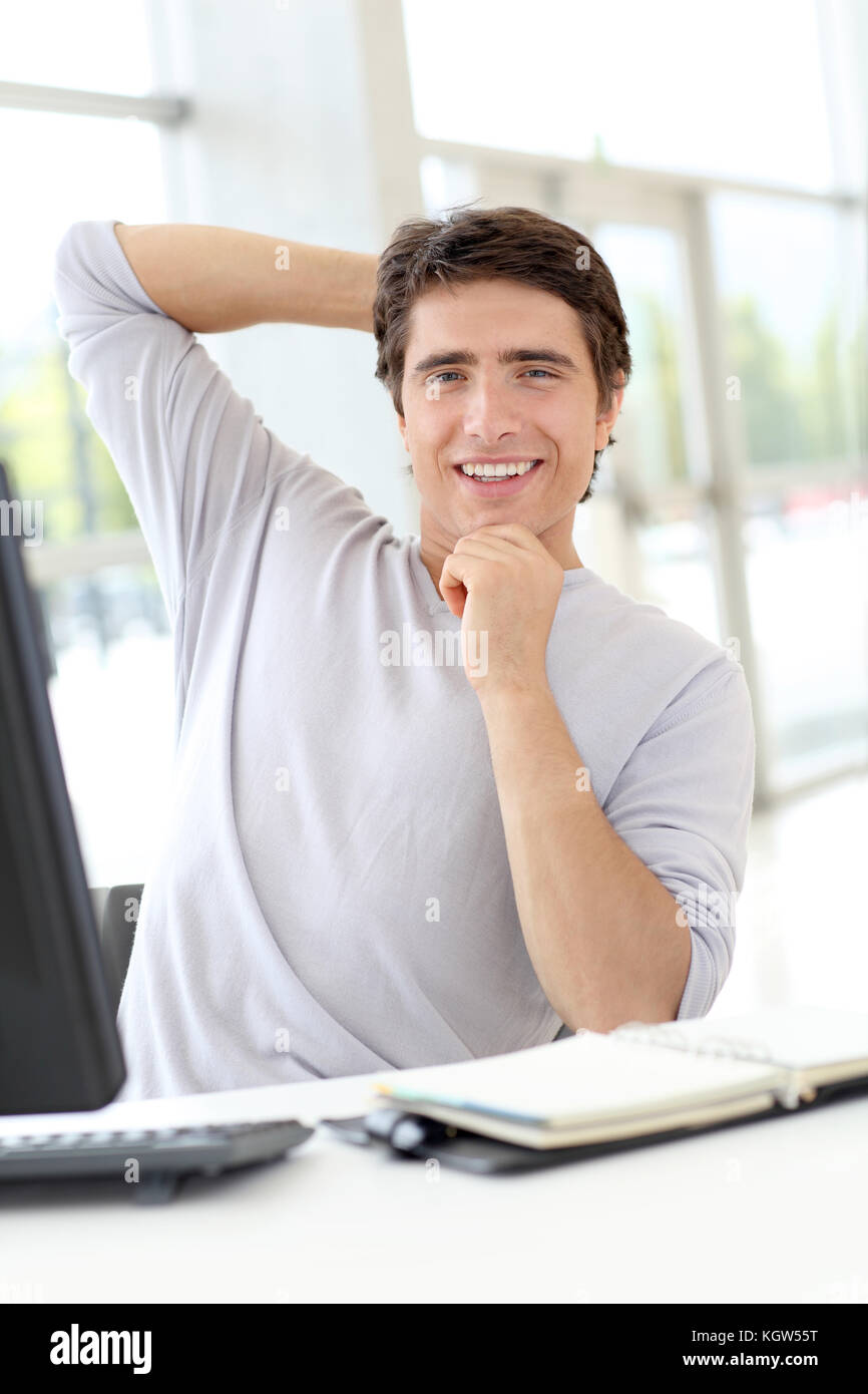 Portrait of relaxed office worker Stock Photo - Alamy