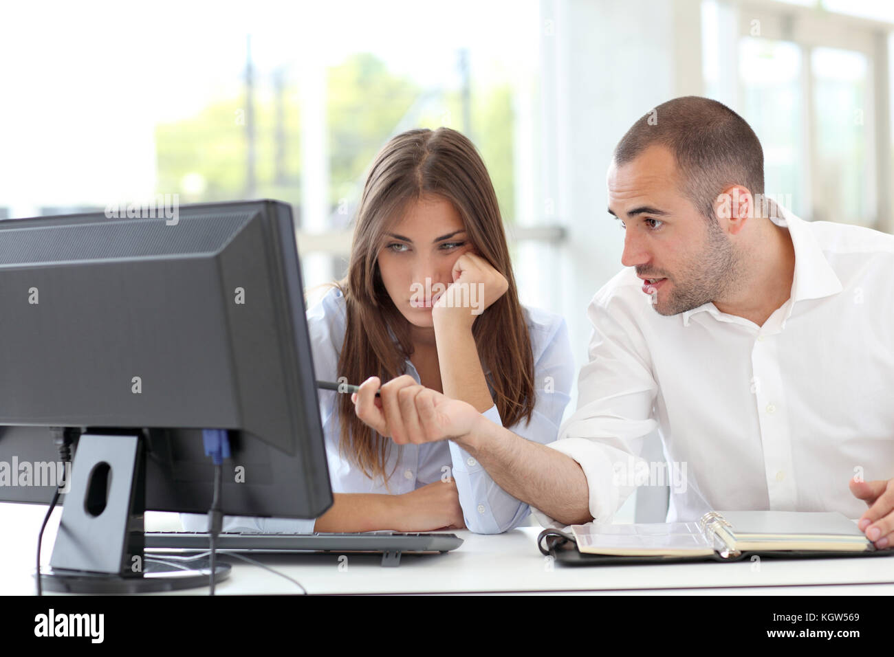 Office workers arguing on project Stock Photo - Alamy