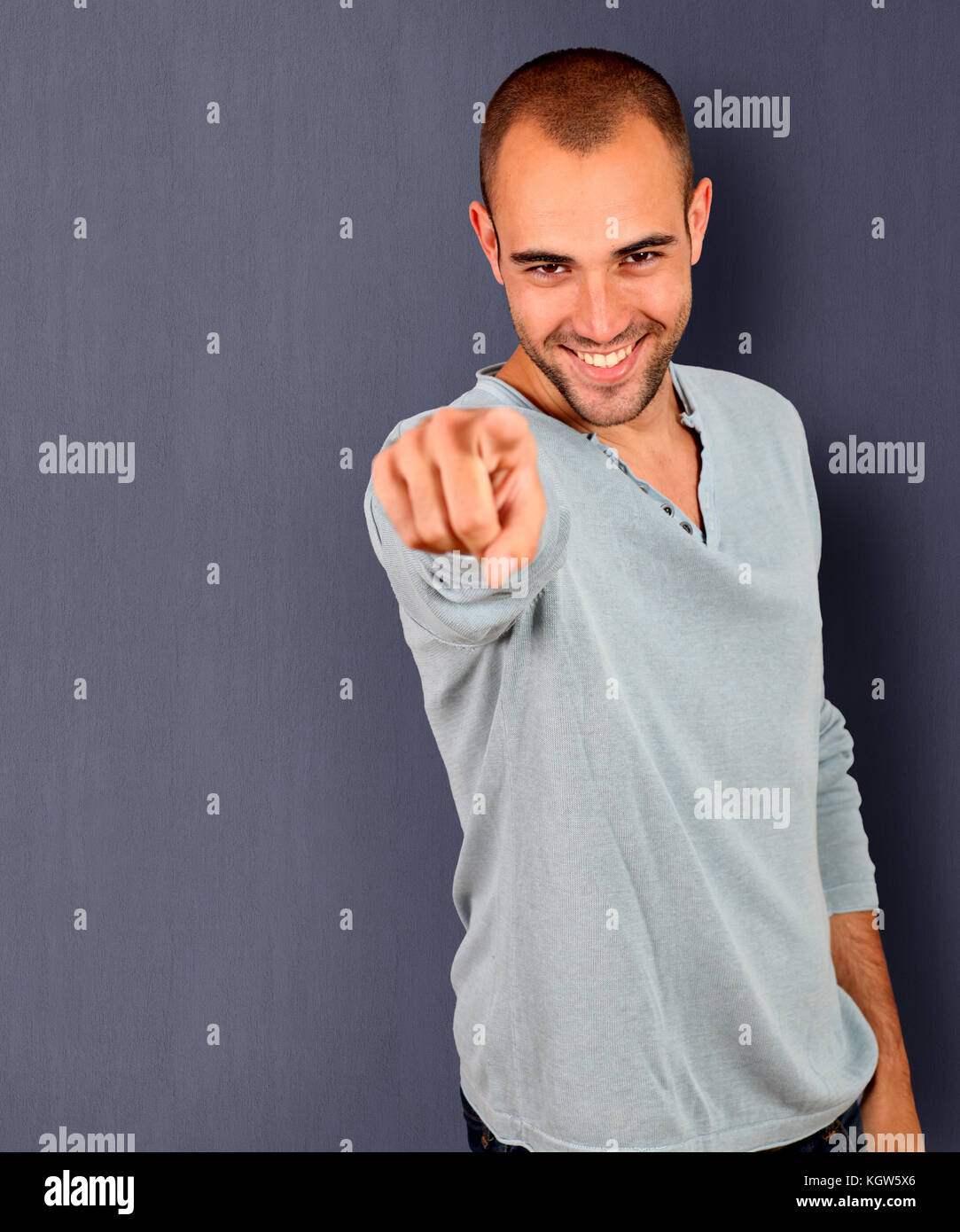 Handsome man pointing finger to camera Stock Photo - Alamy
