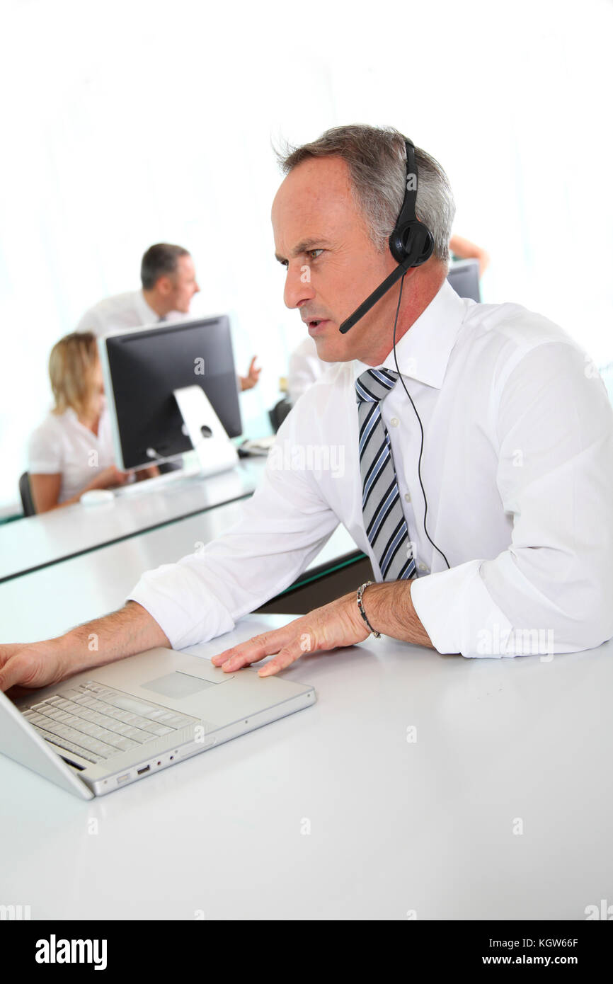Customer service people on the phone Stock Photo - Alamy