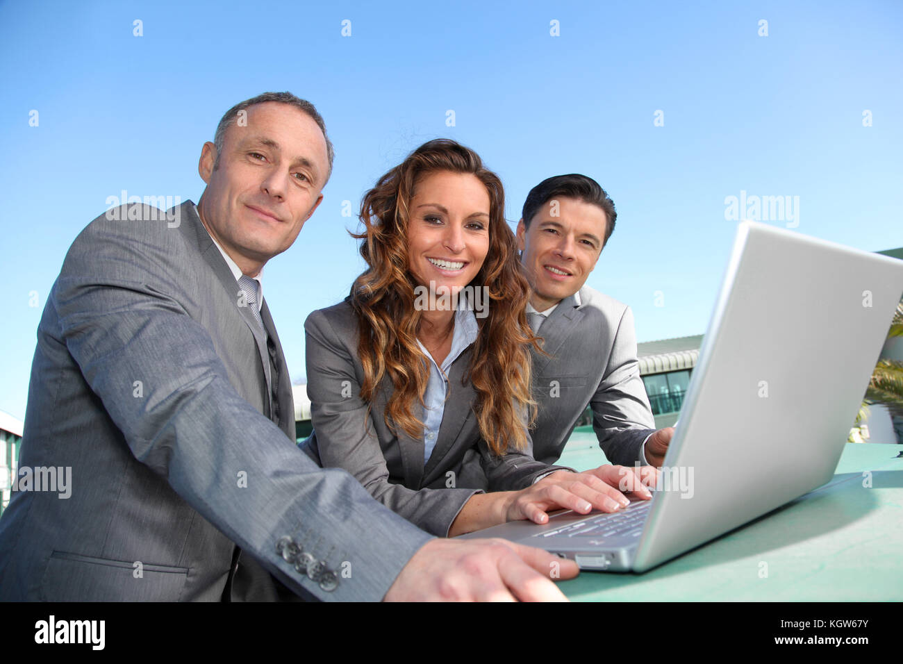 Workteam during a business travel meeting Stock Photo - Alamy