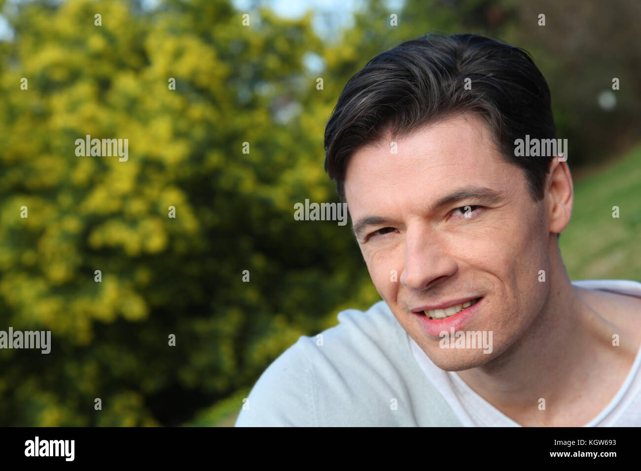 Portrait of handsome smiling man Stock Photo - Alamy