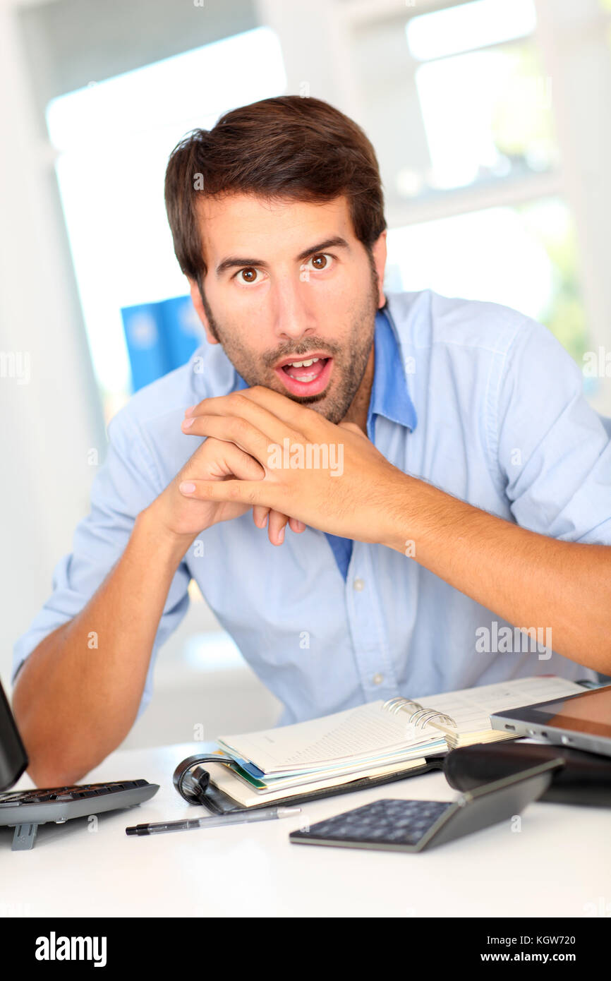 Portrait of happy office worker Stock Photo - Alamy