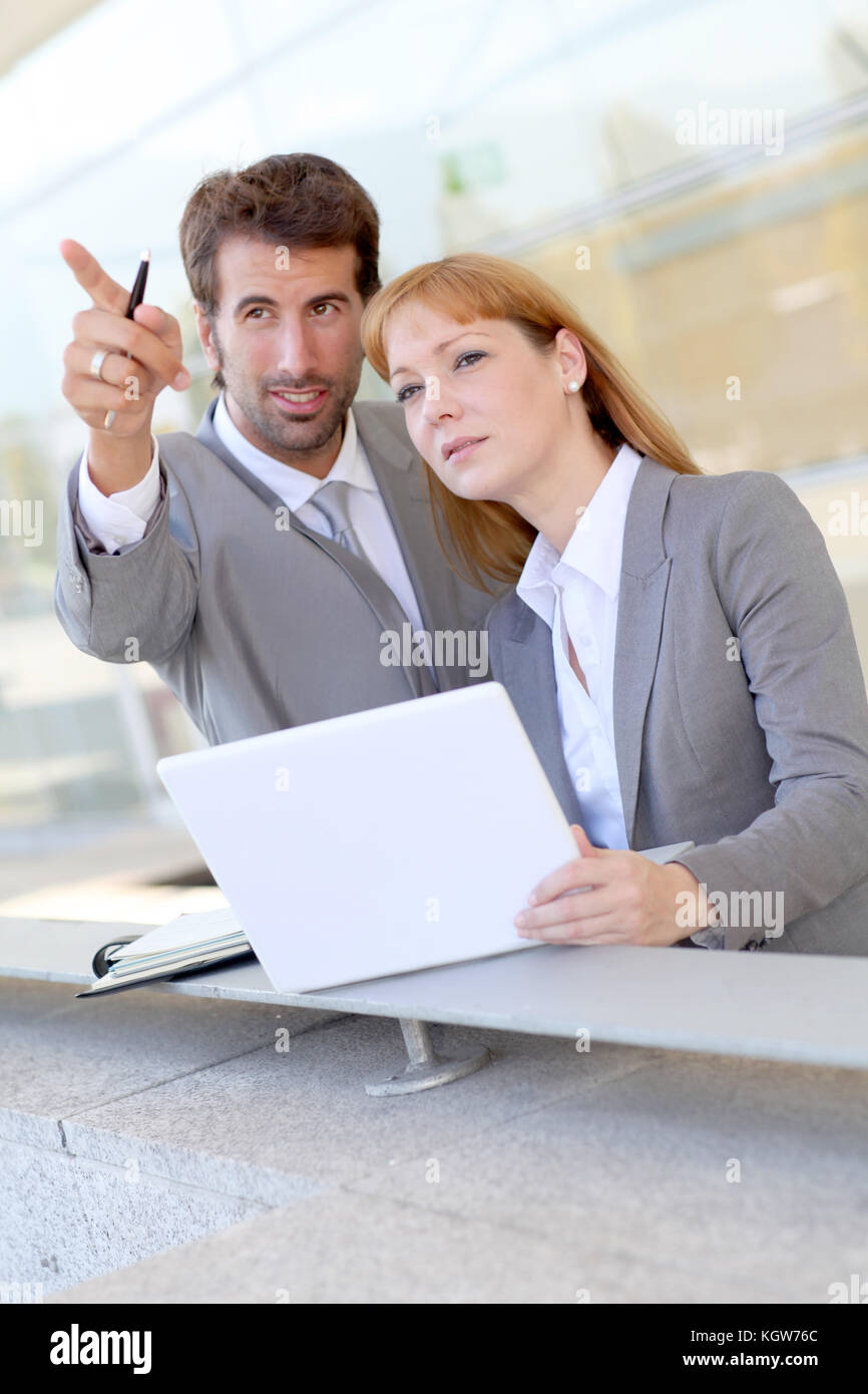 Business people meeting outside the office Stock Photo - Alamy