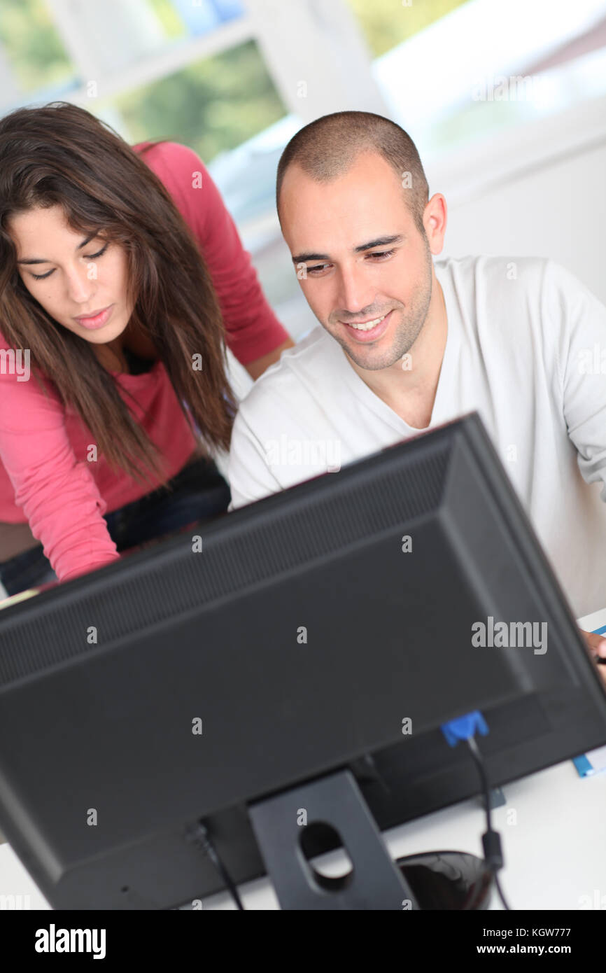 Business team working in office Stock Photo - Alamy