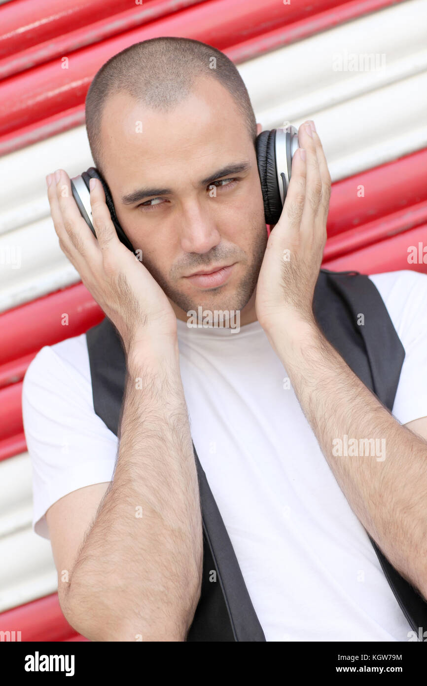 Young man with music headphones Stock Photo - Alamy