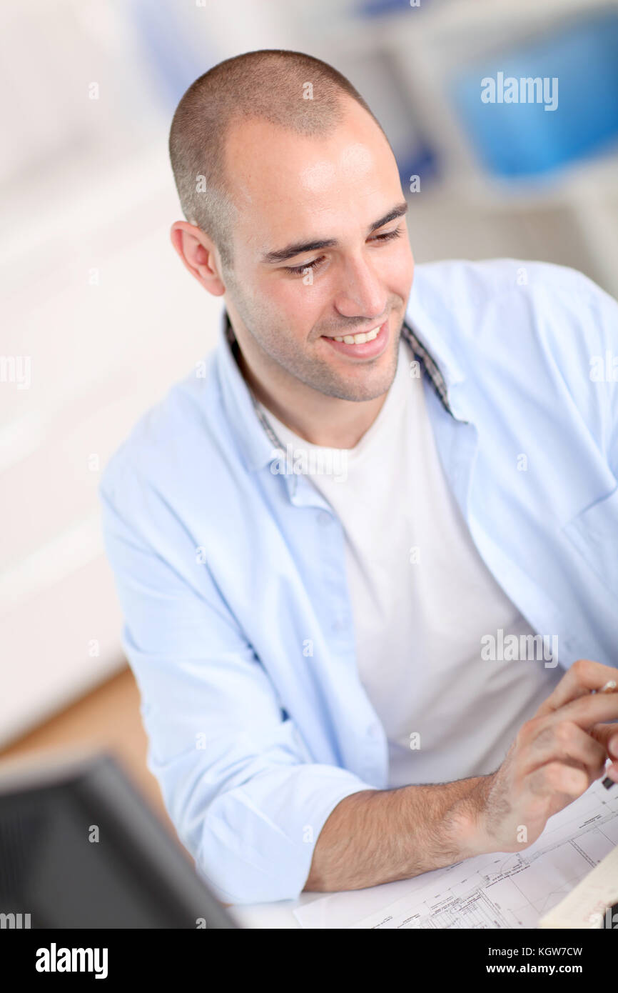 Office worker using electronic tablet Stock Photo - Alamy