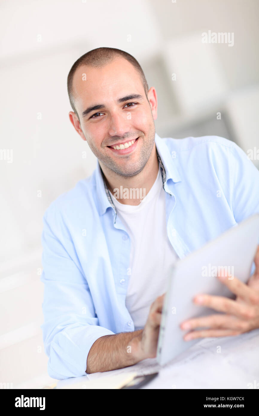 Office worker using electronic tablet Stock Photo - Alamy