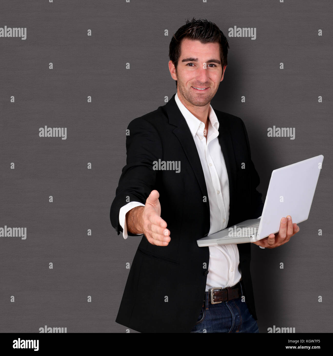 Man giving hand for handshake Stock Photo - Alamy