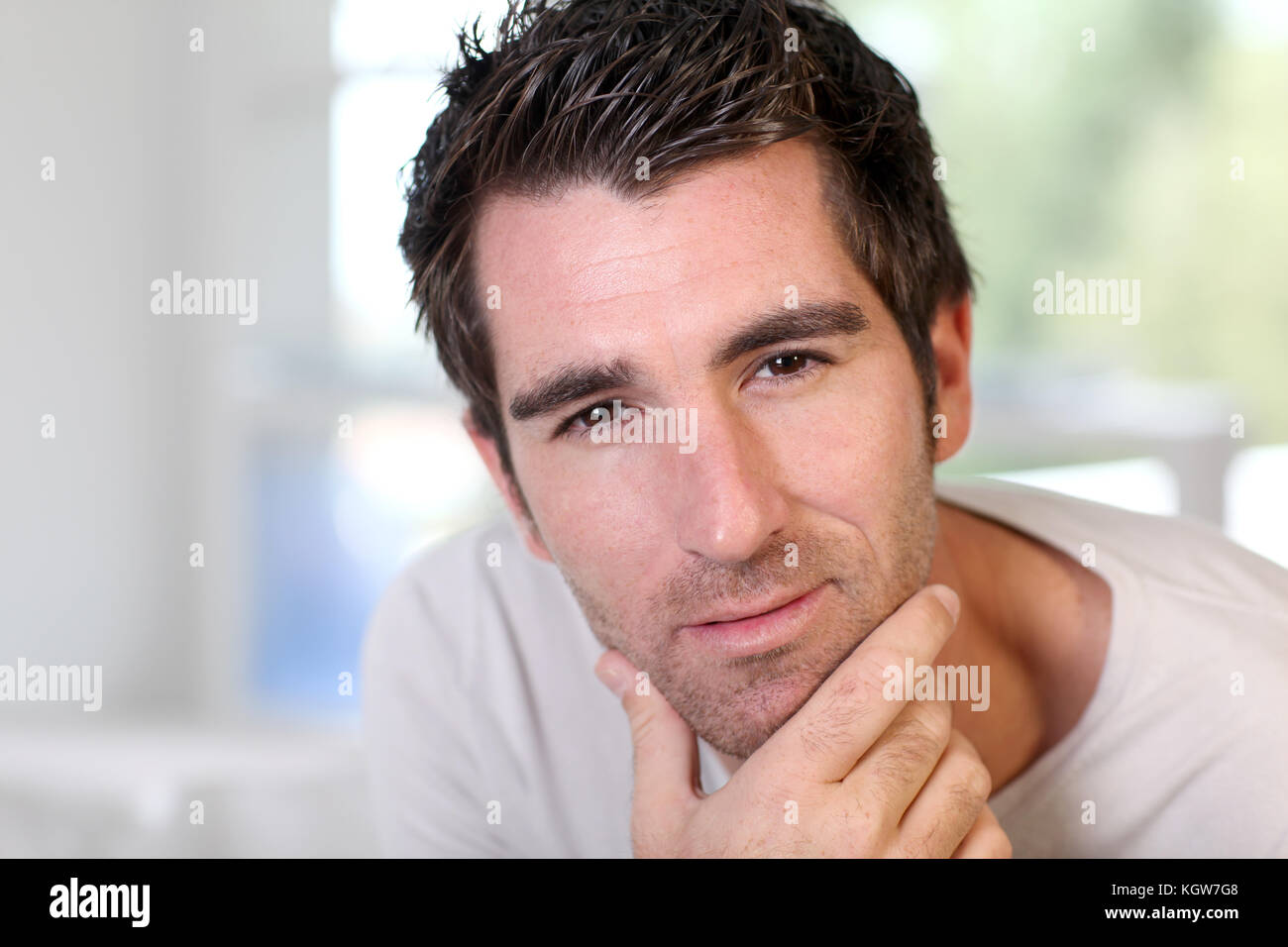 Portrait of handsome guy relaxing at home Stock Photo - Alamy