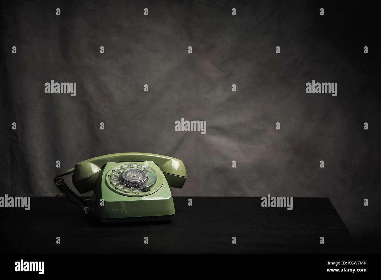 Vintage old phone on the table , still life Stock Photo - Alamy