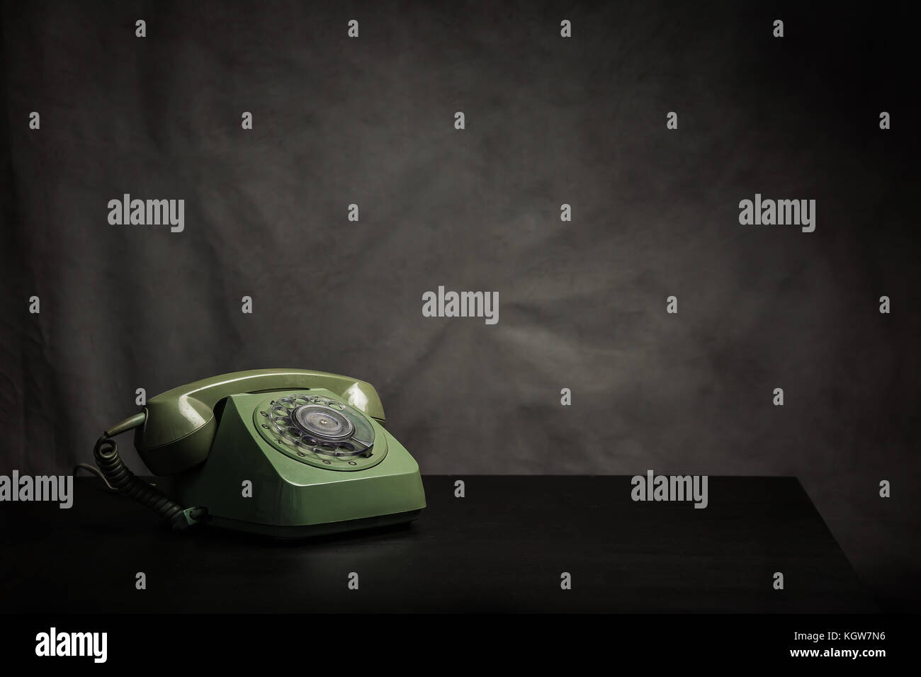 Vintage old phone on the table , still life Stock Photo - Alamy