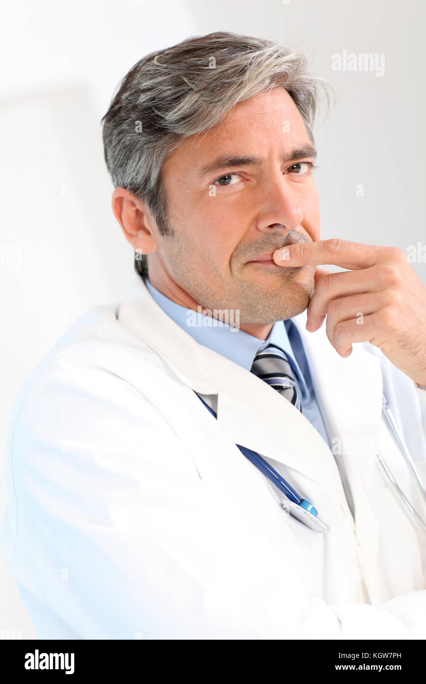 Portrait of handsome doctor Stock Photo - Alamy