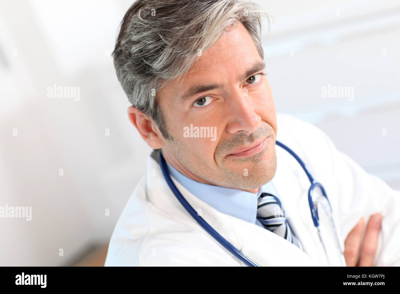 Portrait of handsome doctor Stock Photo - Alamy