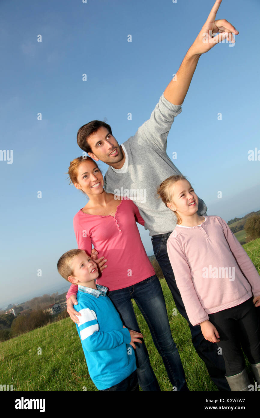 Family having a walk in countryside Stock Photo - Alamy