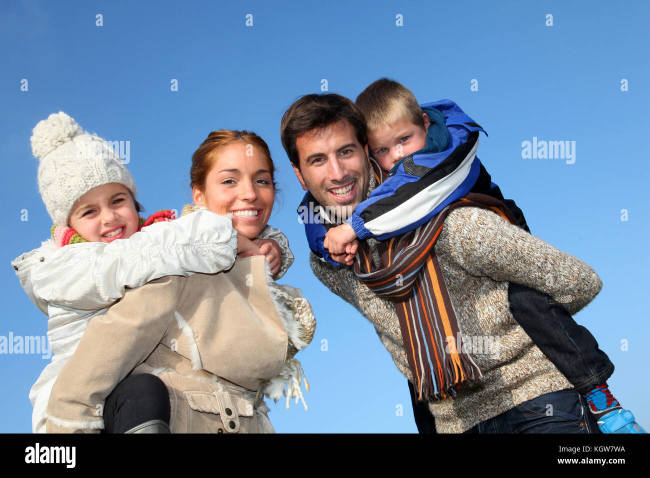 Family of 4 people in countryside Stock Photo - Alamy