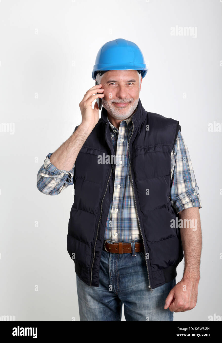 Foreman talking on the phone Stock Photo - Alamy
