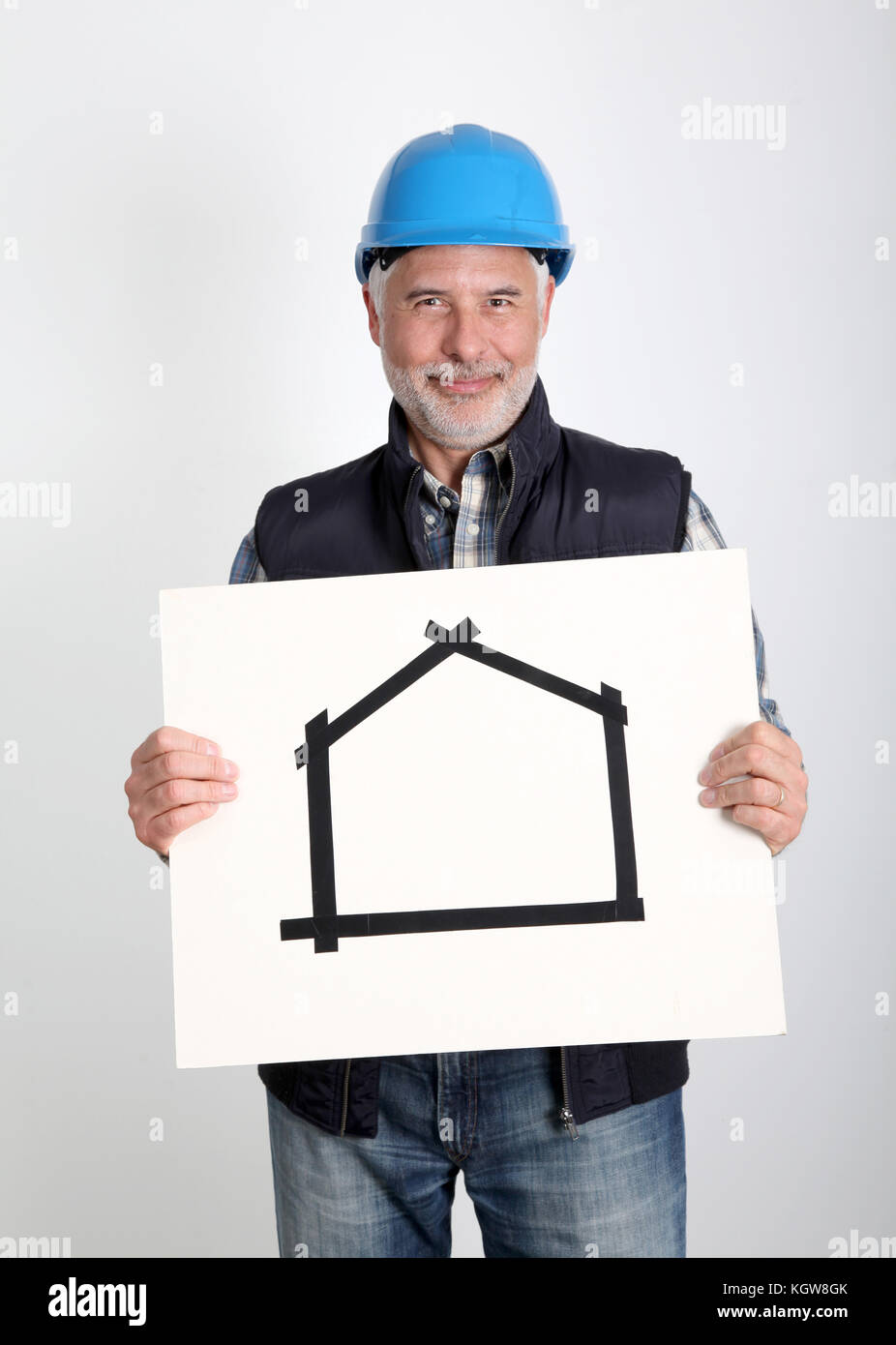 Property developer showing house for sale sign Stock Photo - Alamy