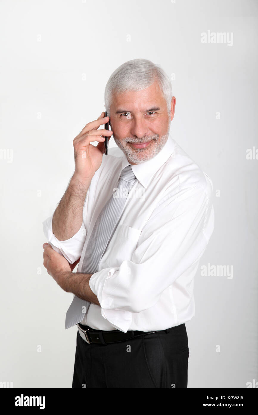 Sales manager talking on mobile phone Stock Photo - Alamy