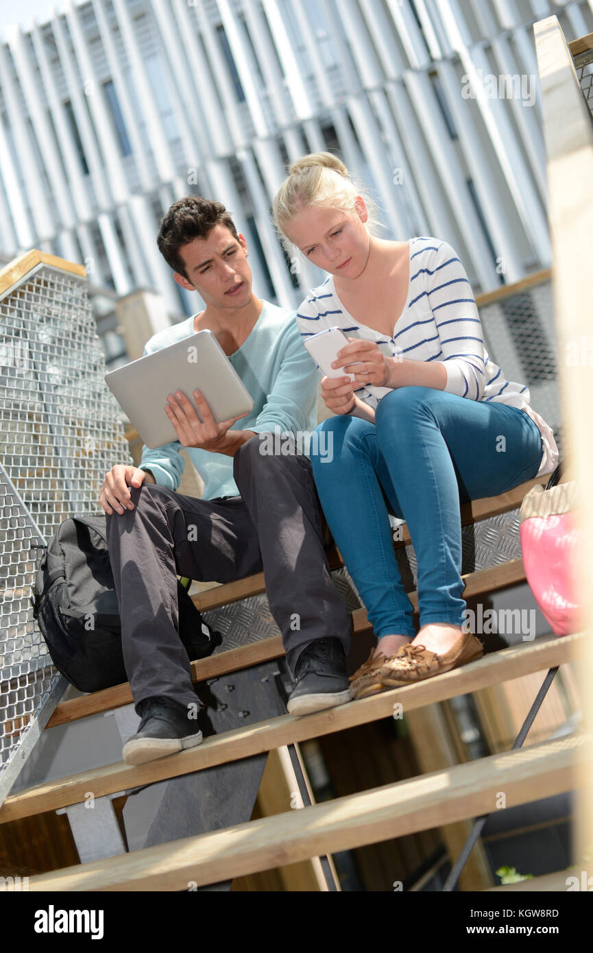 Students in school yard hi-res stock photography and images - Alamy