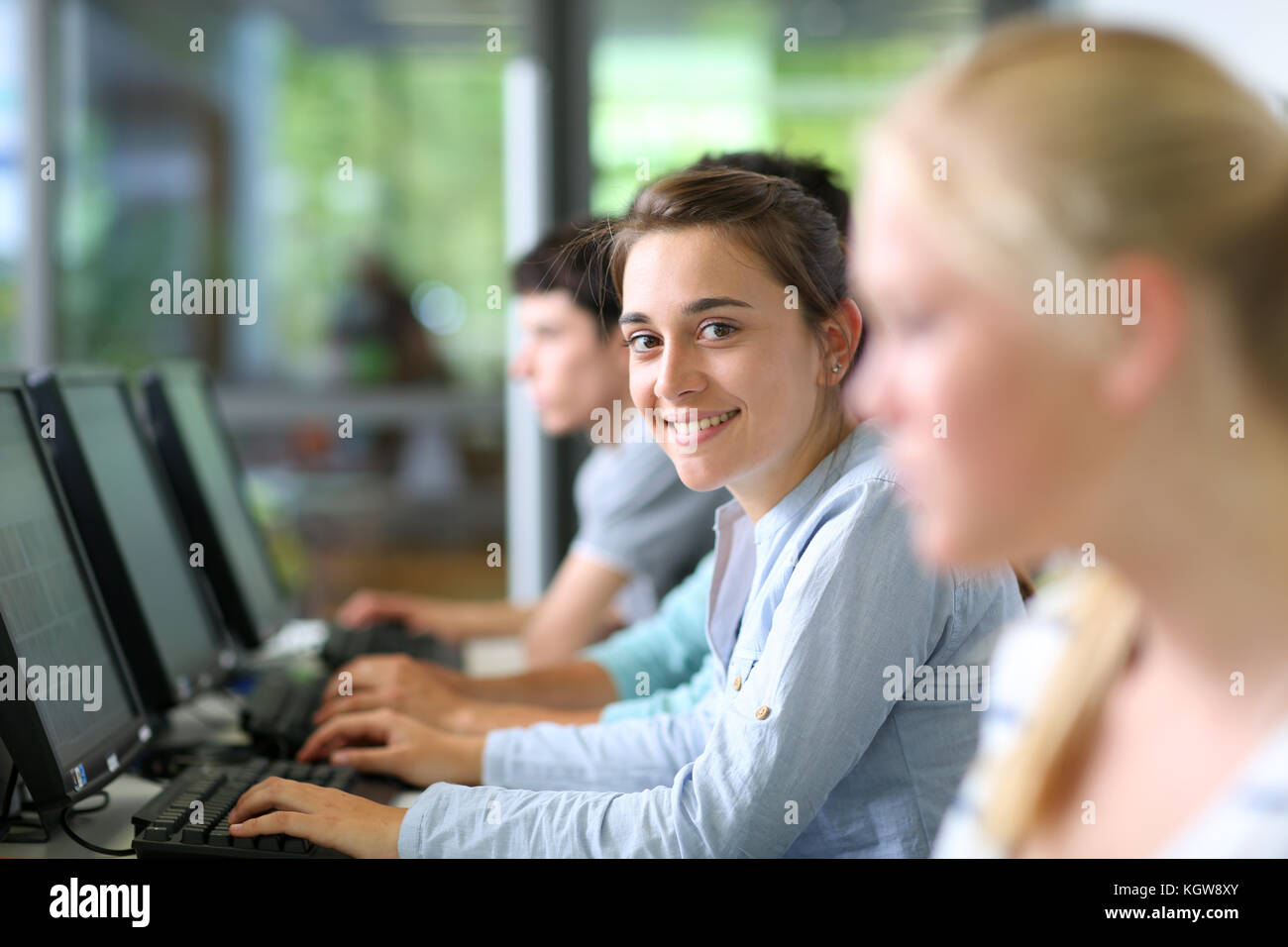 Students in class working on desktop computer Stock Photo - Alamy