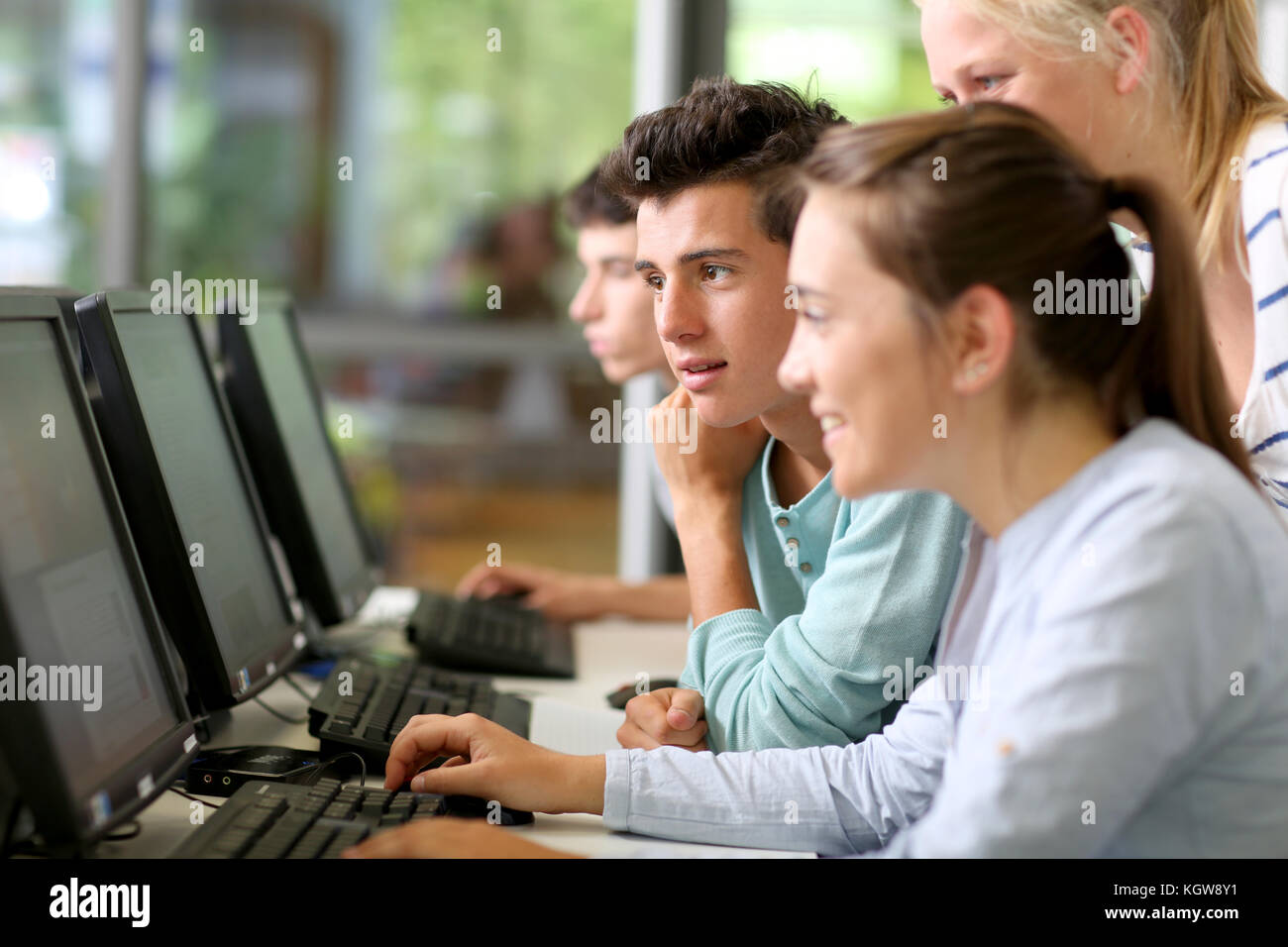 Students in class working on desktop computer Stock Photo - Alamy
