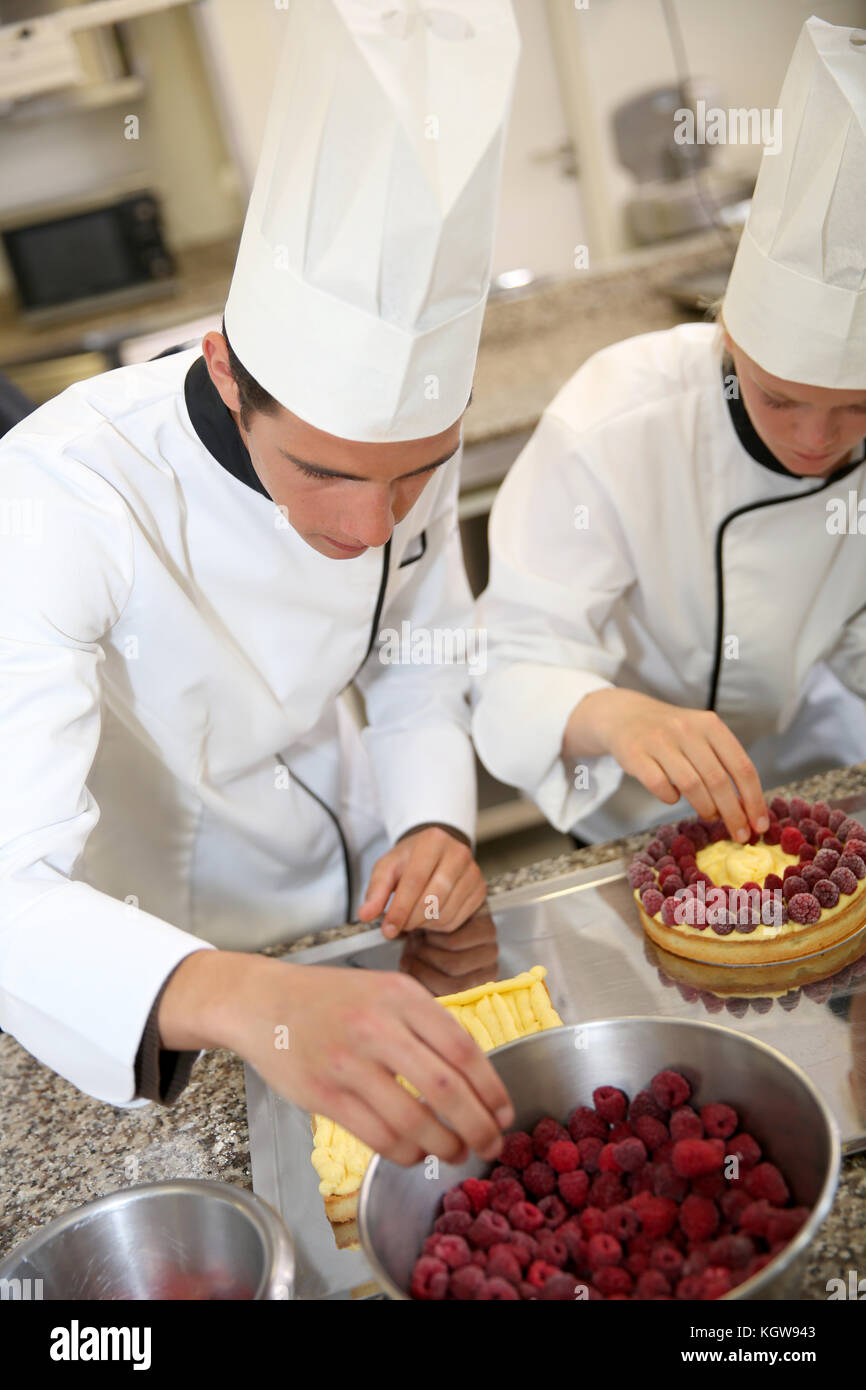 Students in training class making French pastry Stock Photo - Alamy