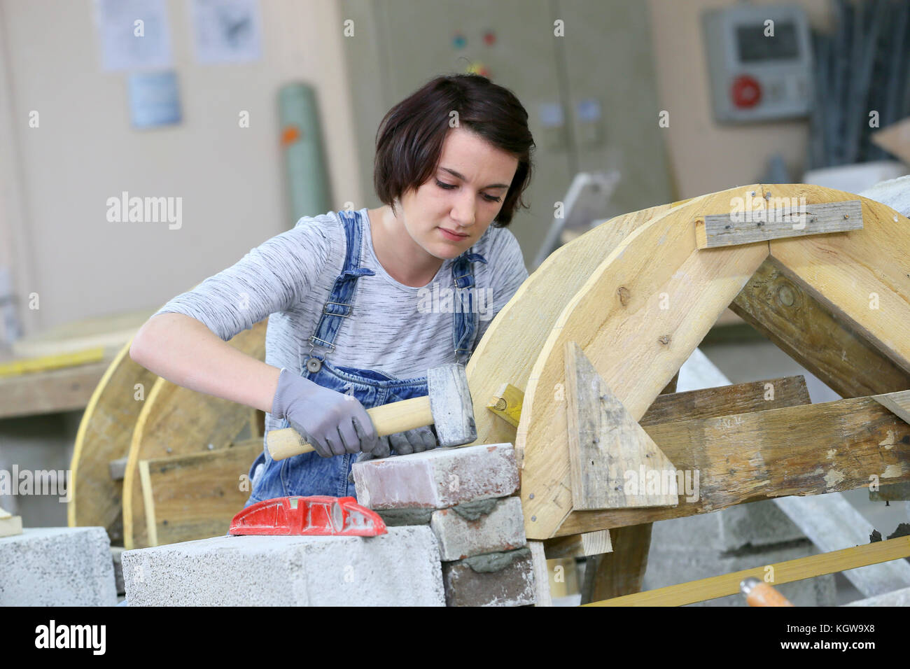 Young woman in masonry professional school Stock Photo - Alamy