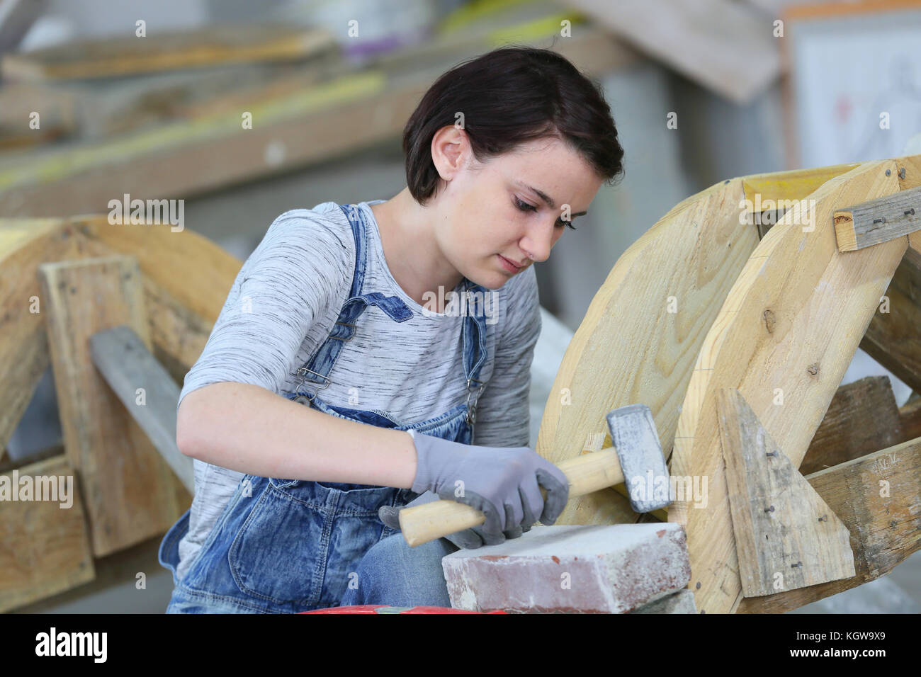 Young woman in masonry professional school Stock Photo - Alamy