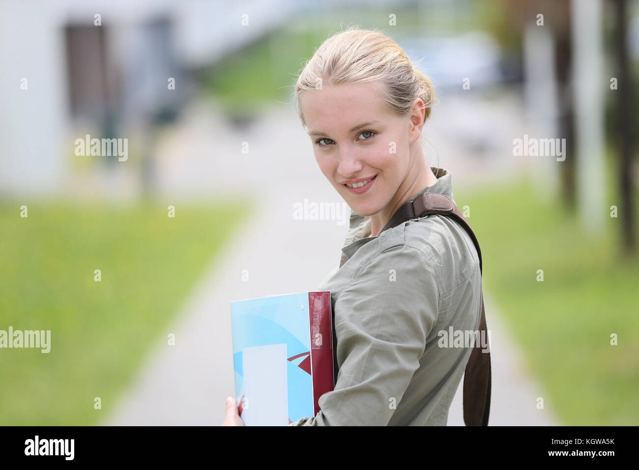 Portrait of young student girl at school campus Stock Photo - Alamy