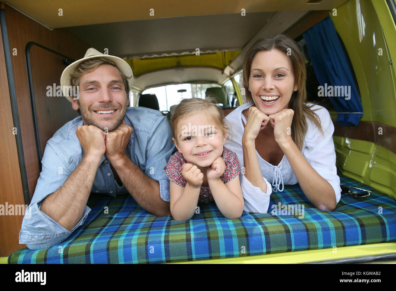 Portrait of cheerful family having fun in camper Stock Photo - Alamy