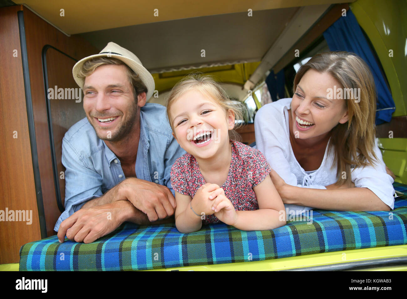Portrait of cheerful family having fun in camper Stock Photo - Alamy