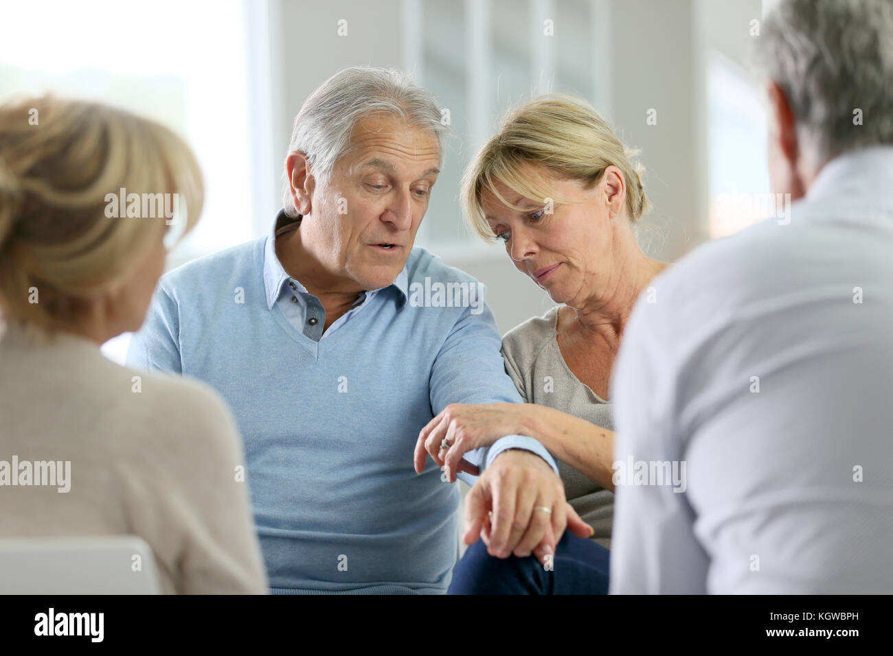 Group therapy meeting old hi-res stock photography and images - Alamy