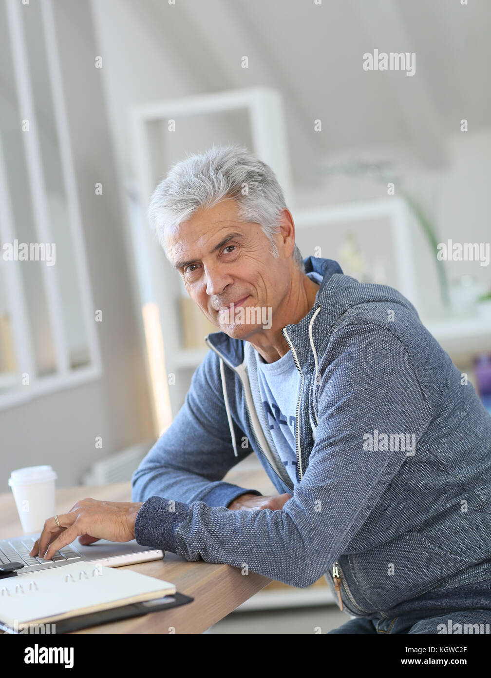 Senior man working from home on laptop computer Stock Photo - Alamy