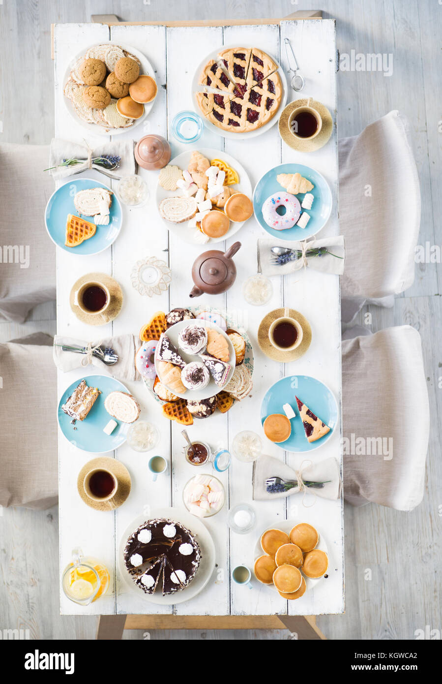 Various homemade appetizing sweet food prepared and served for guests ...