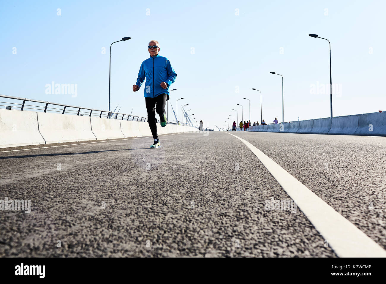 Running down the road hi-res stock photography and images - Alamy