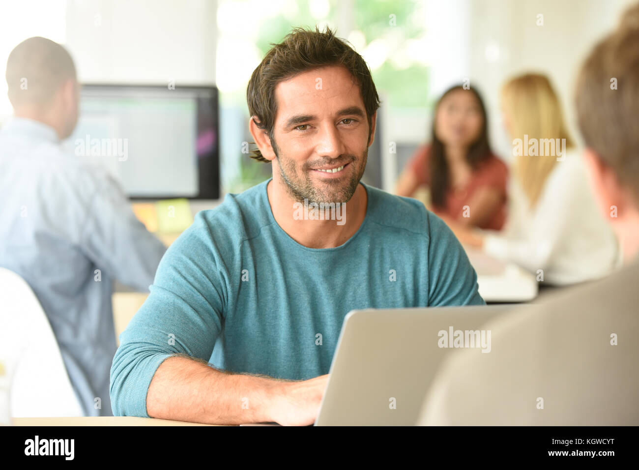 Businessman in office meeting with client Stock Photo - Alamy