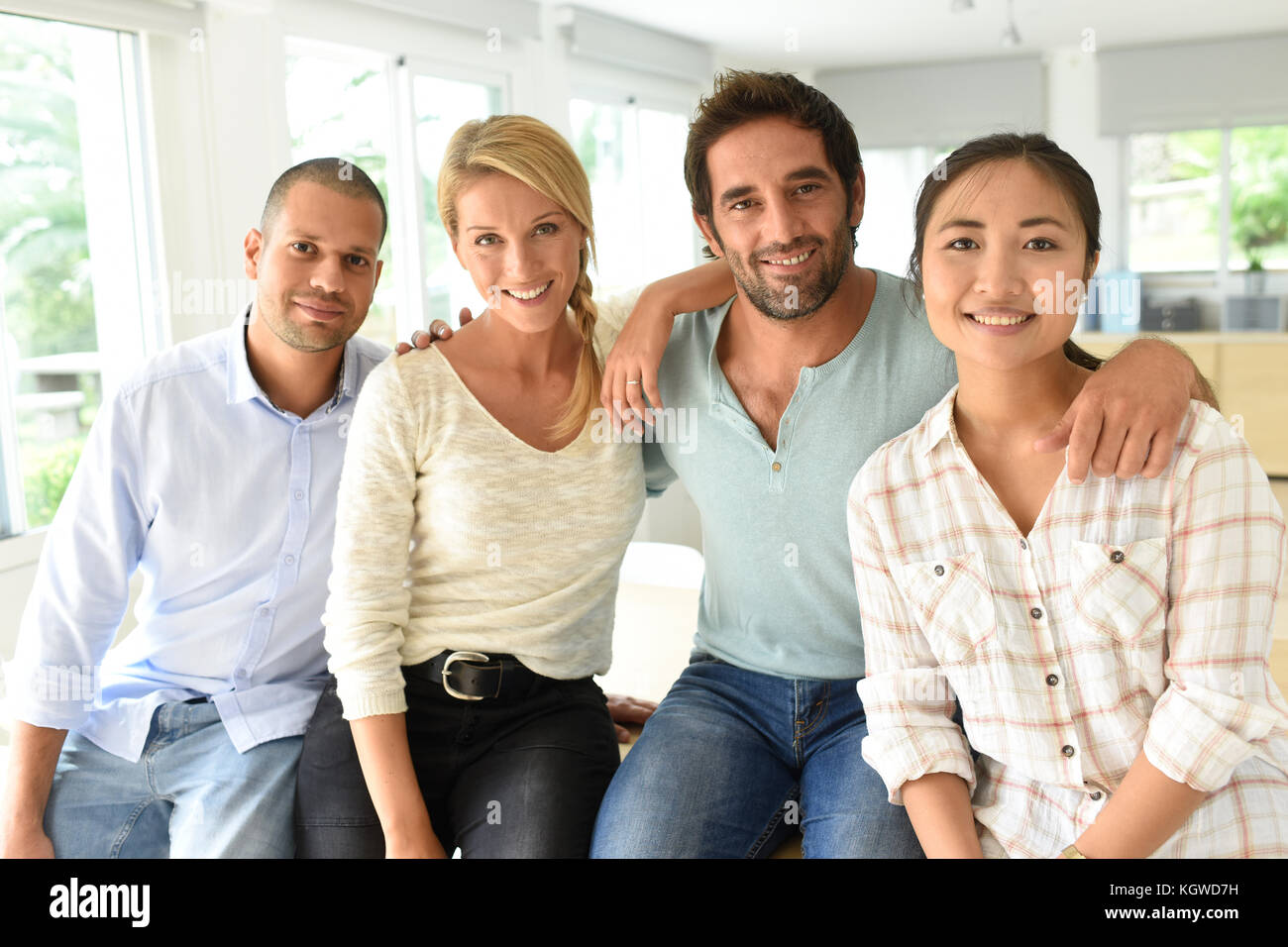 Group of ethnic people having fun together Stock Photo - Alamy